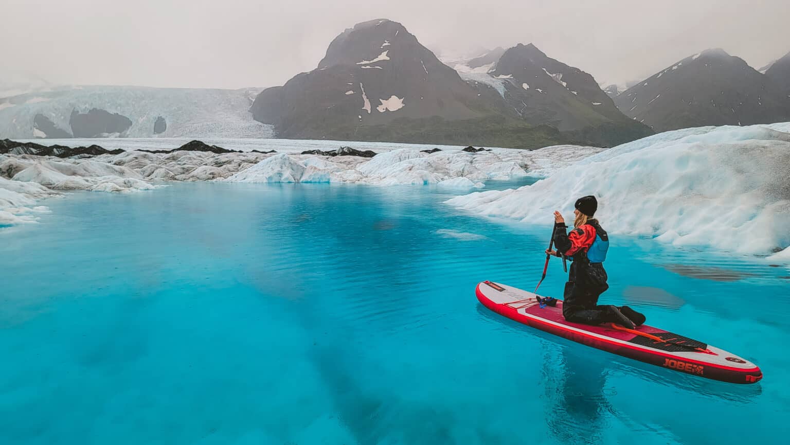 Knik Glacier Paddle Boarding In Alaska - Outbound Heli Adventures